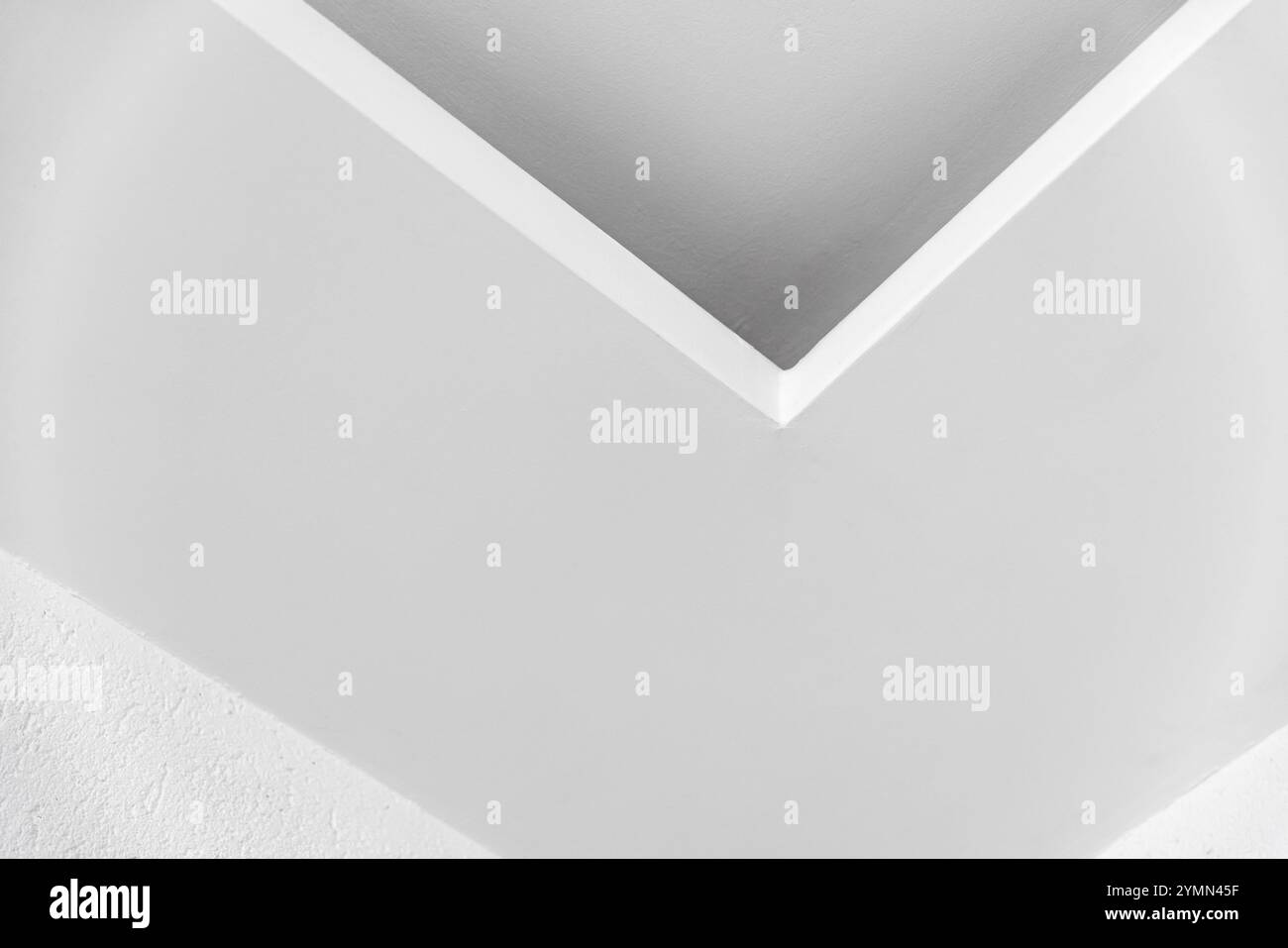 Abstract white minimal interior background with corner of ceiling niche ...