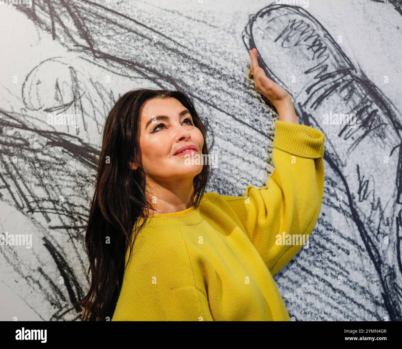 London, UK, 22nd Nov 2024. The artist with one of the drawings, which ...