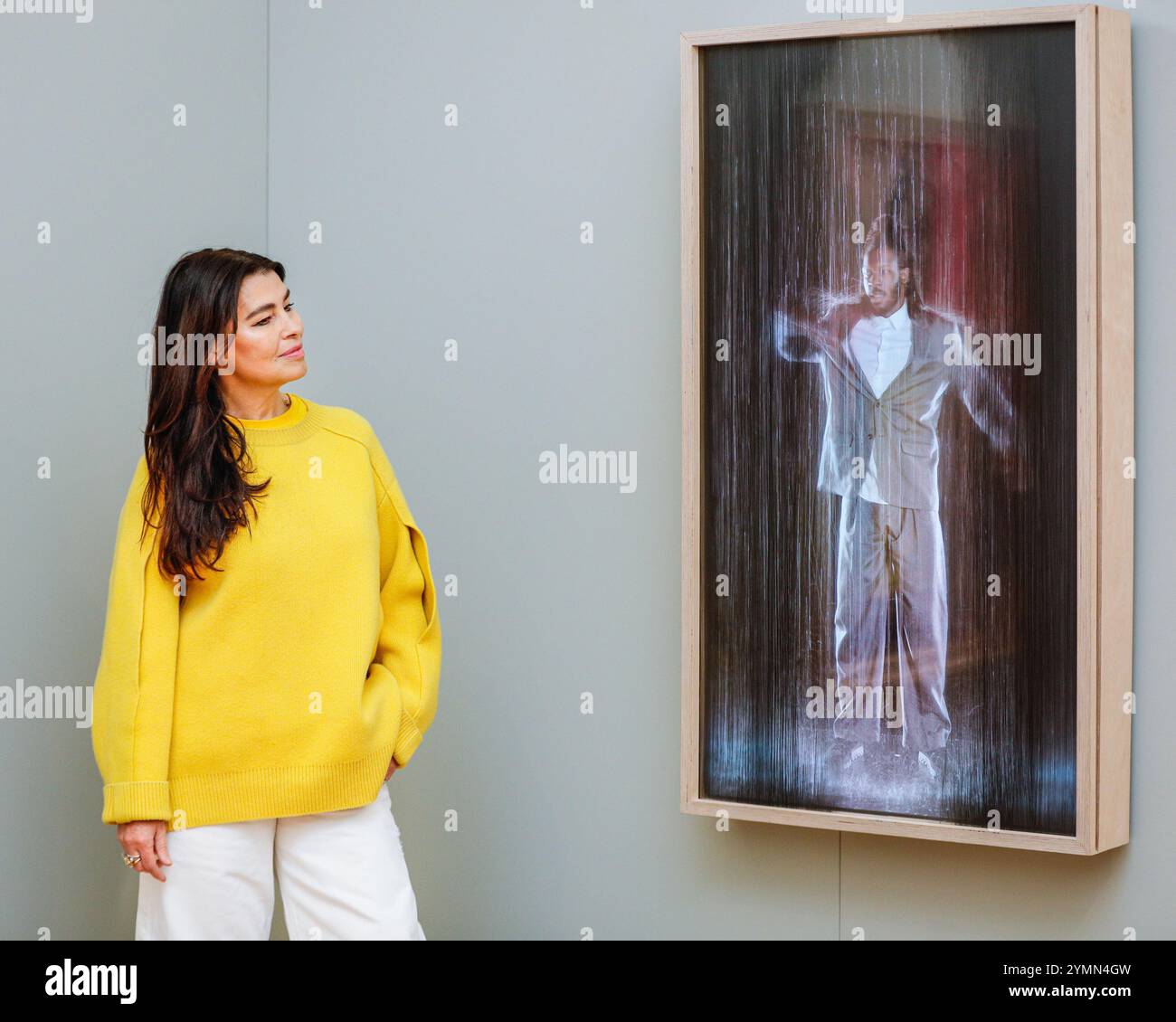London, UK, 22nd Nov 2024. The artist with 'Surfacing III', 2024 in the ...