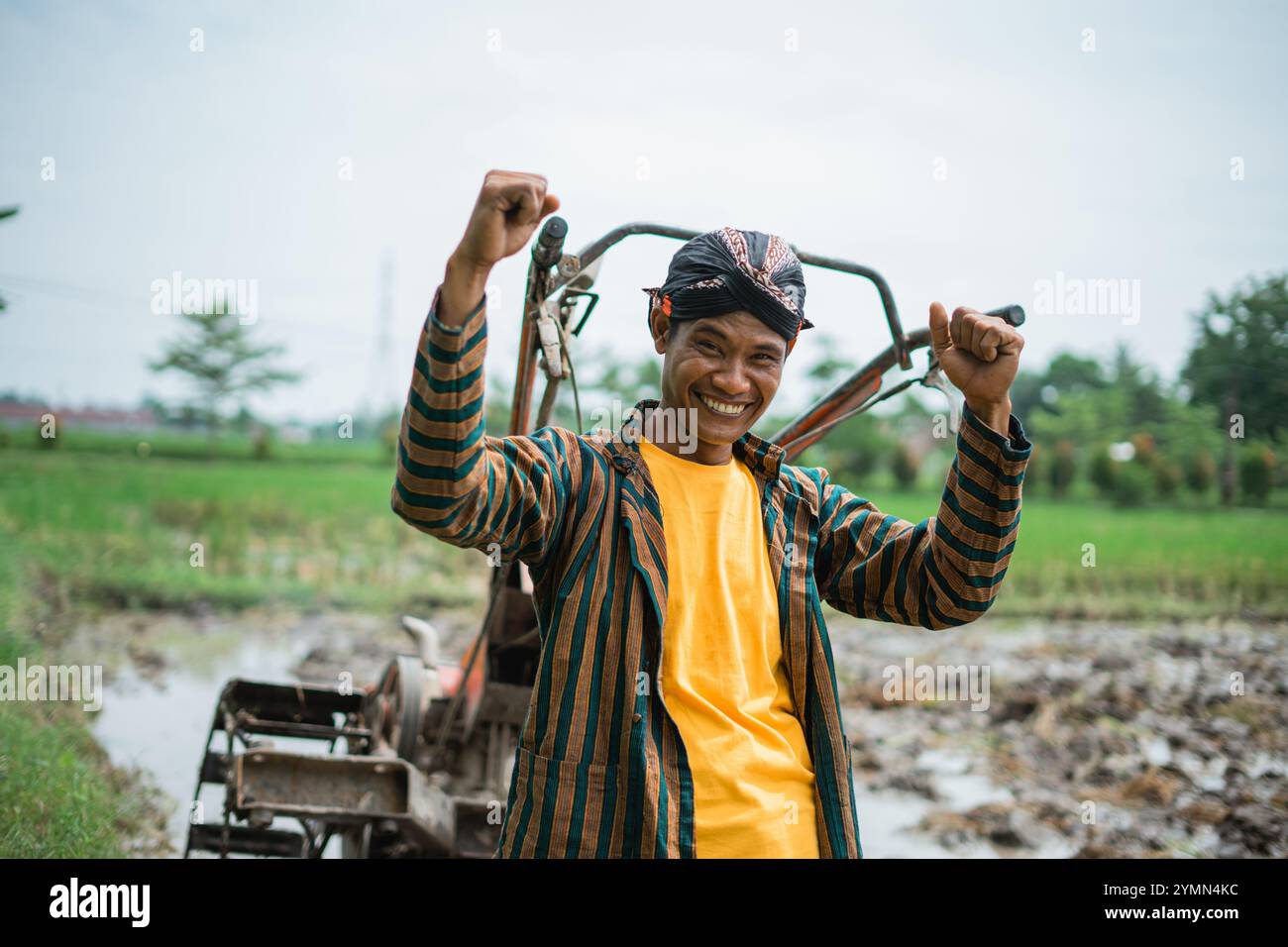 A Joyful Farmer Celebrating Their Hard Work in Lush, Green Fields of ...