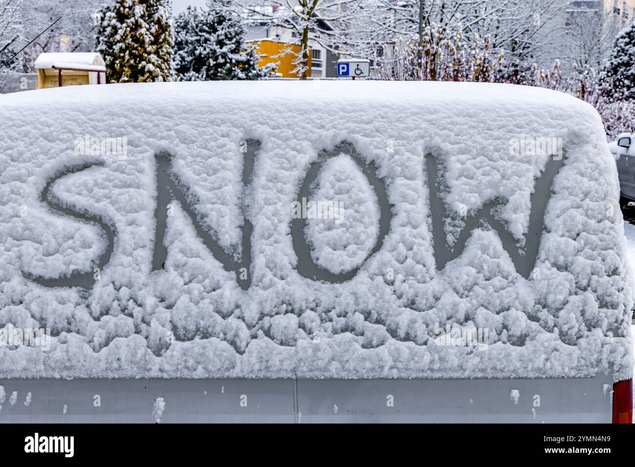 The attack of winter, the first snowfall, the word snow written on the ...