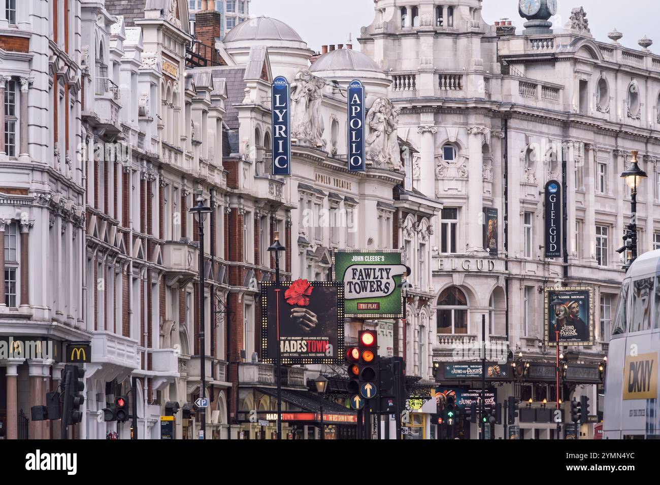 Street view of London's West End featuring historic theatre buildings ...