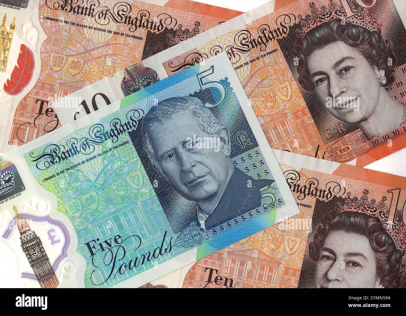 A King Charles III £5 banknote from the United Kingdom against a ...