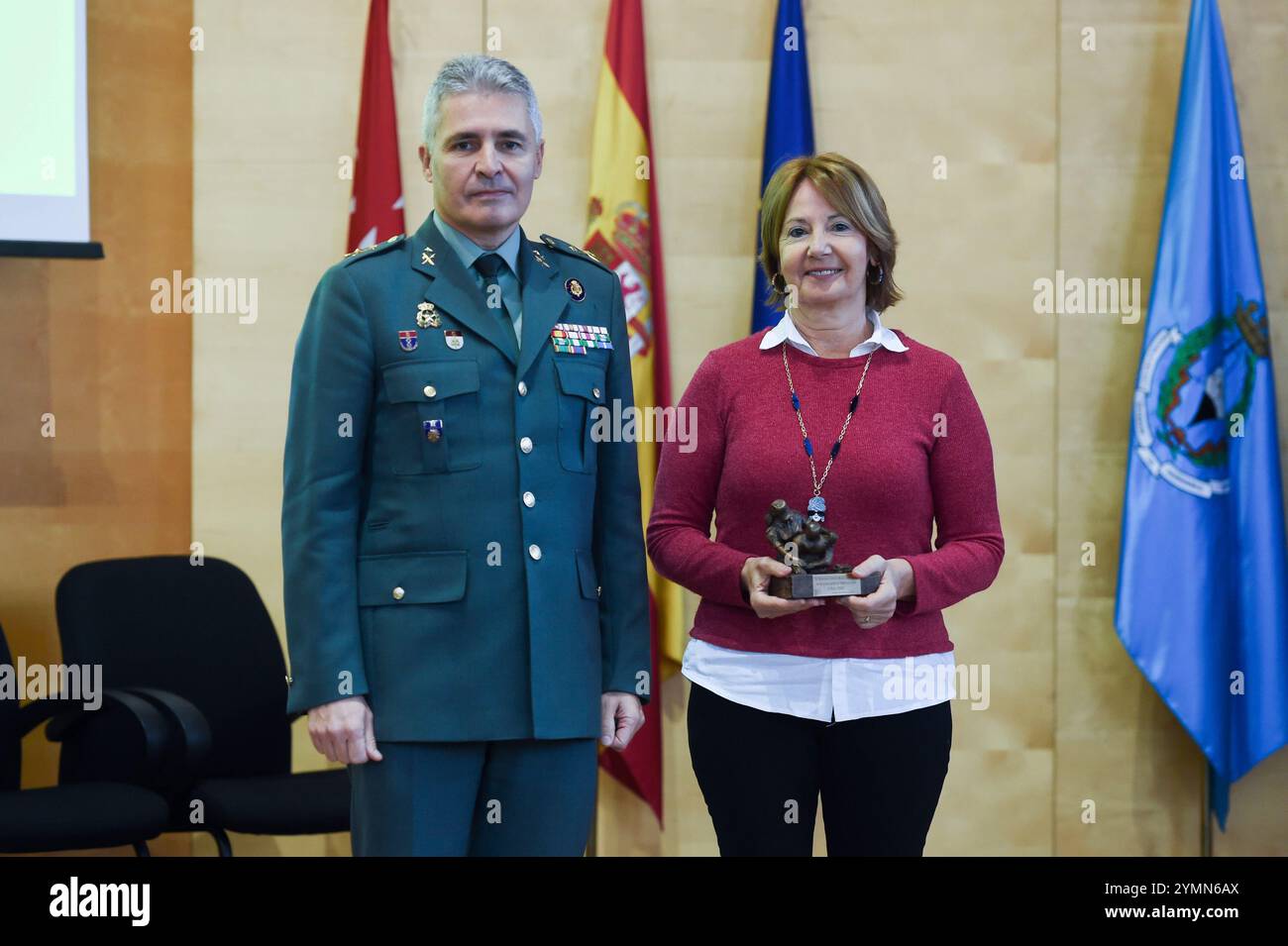 Diaconia's national coordinator, Eva Marquéz, collects the award from ...