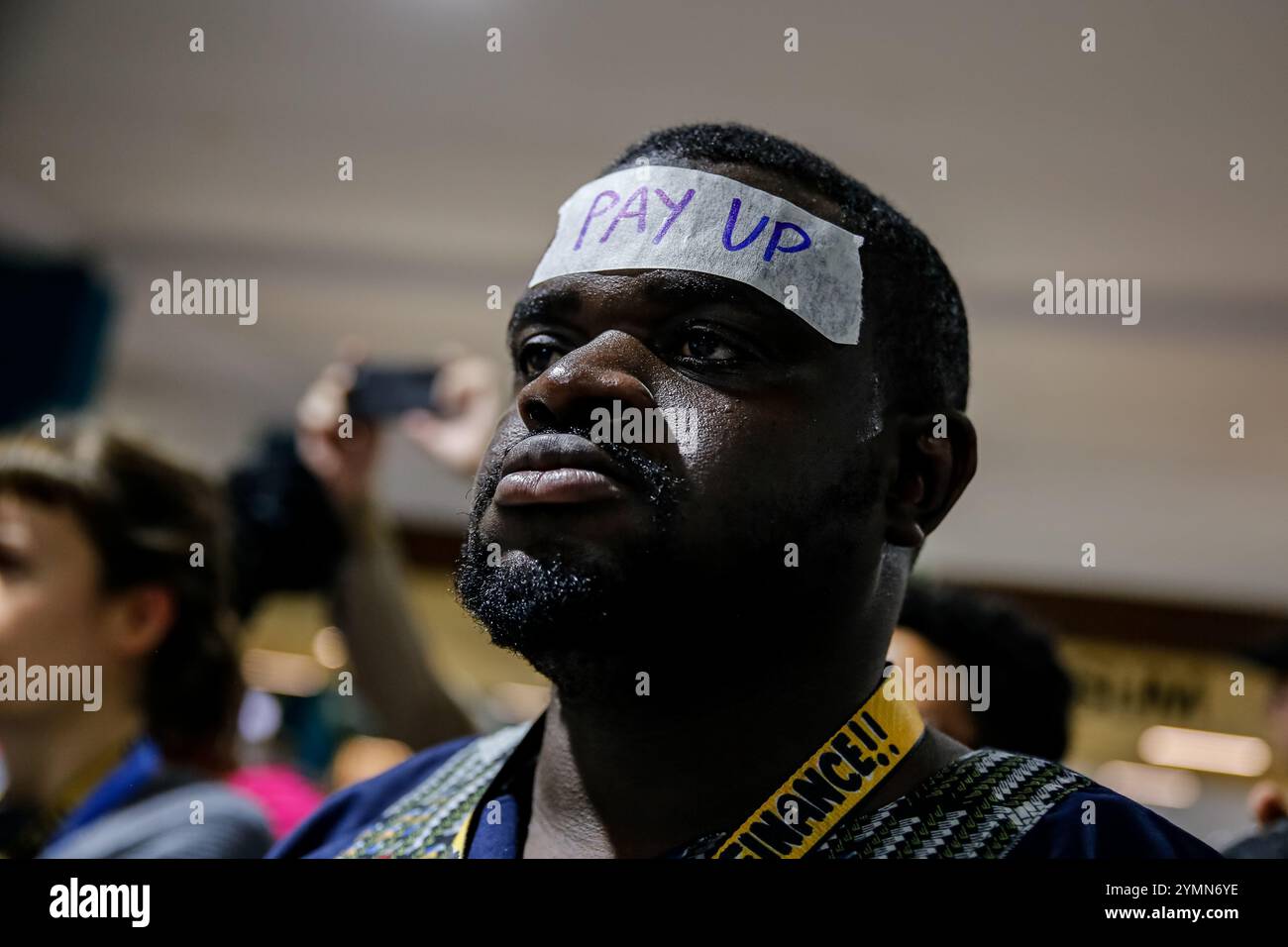 Activists protest to push climate funding in Blue Zone during United ...