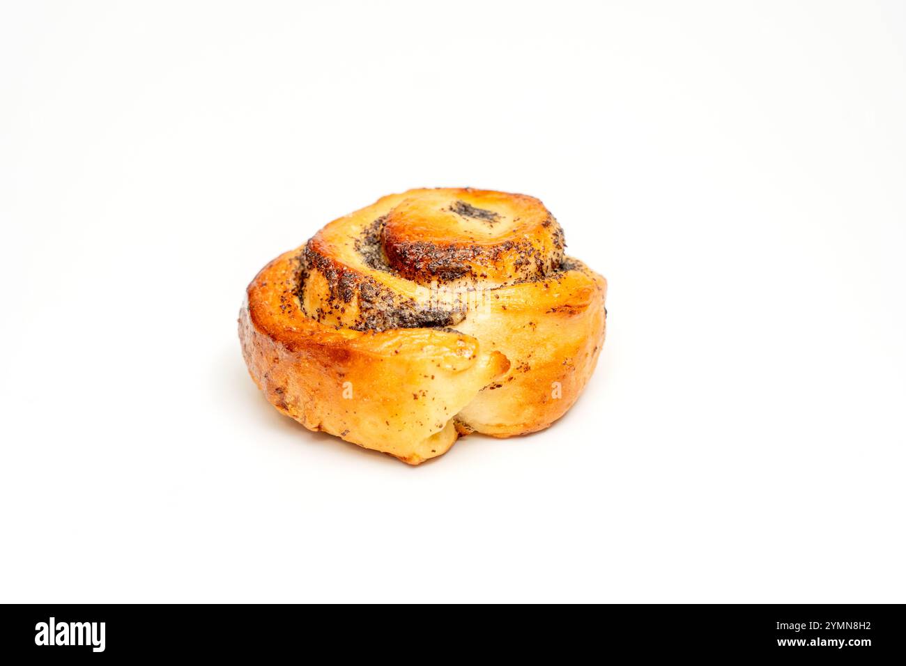 A cinnamon roll sits on a white background. The roll is brown and has a ...