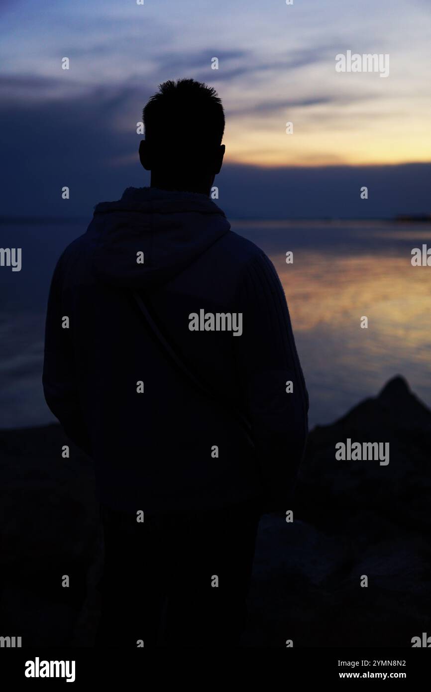 Sad and Emotional man looking at the horizon to symbolize mental health ...