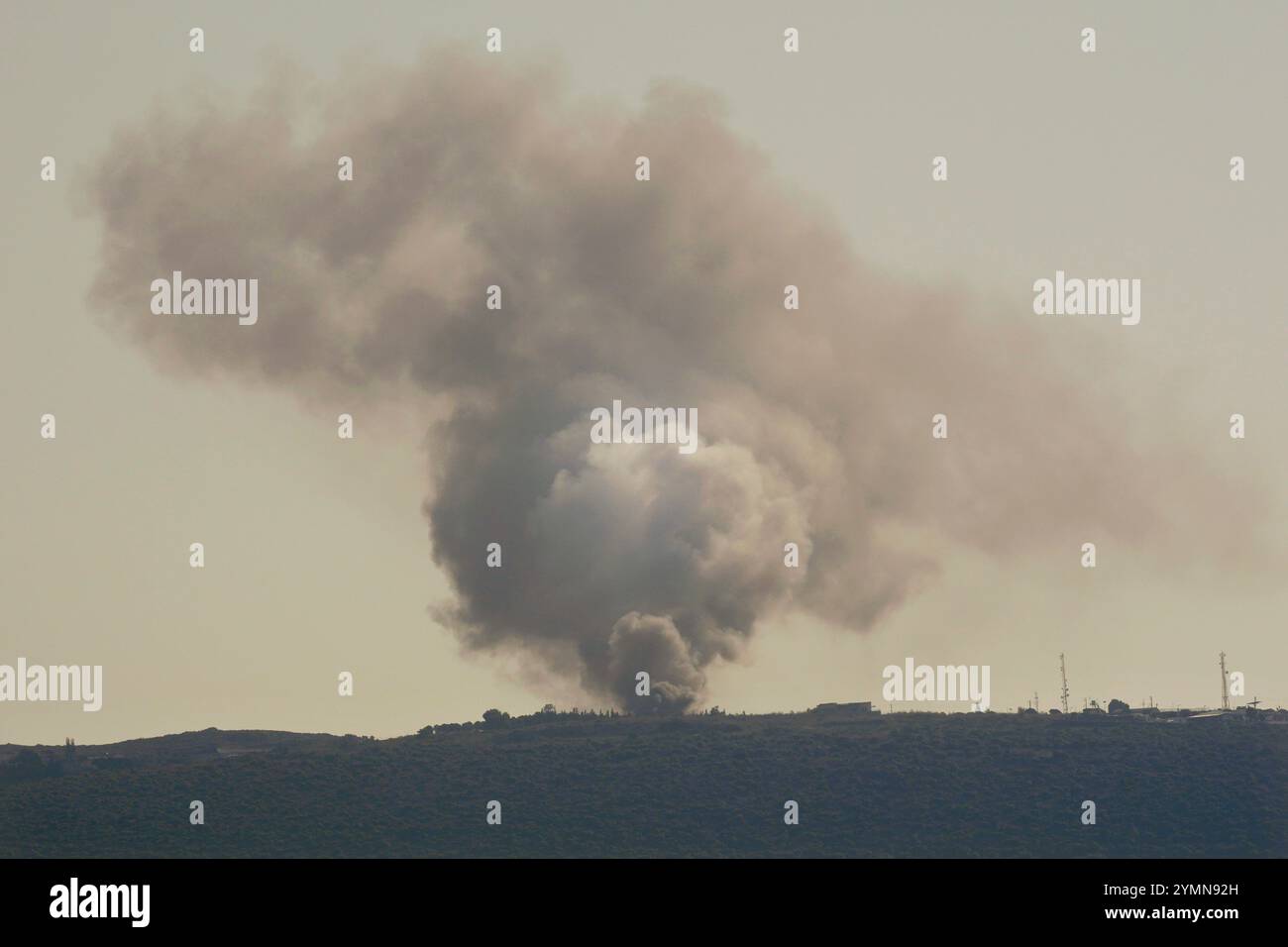 Smoke rising above a Lebanese hill between Tair Harfa and Chamaa ...