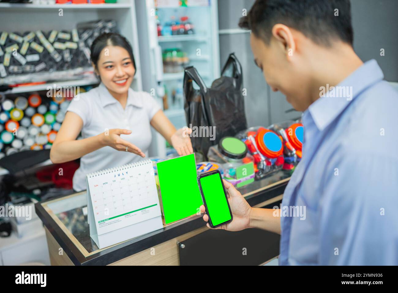 Worker using smartphone scan hi-res stock photography and images - Alamy