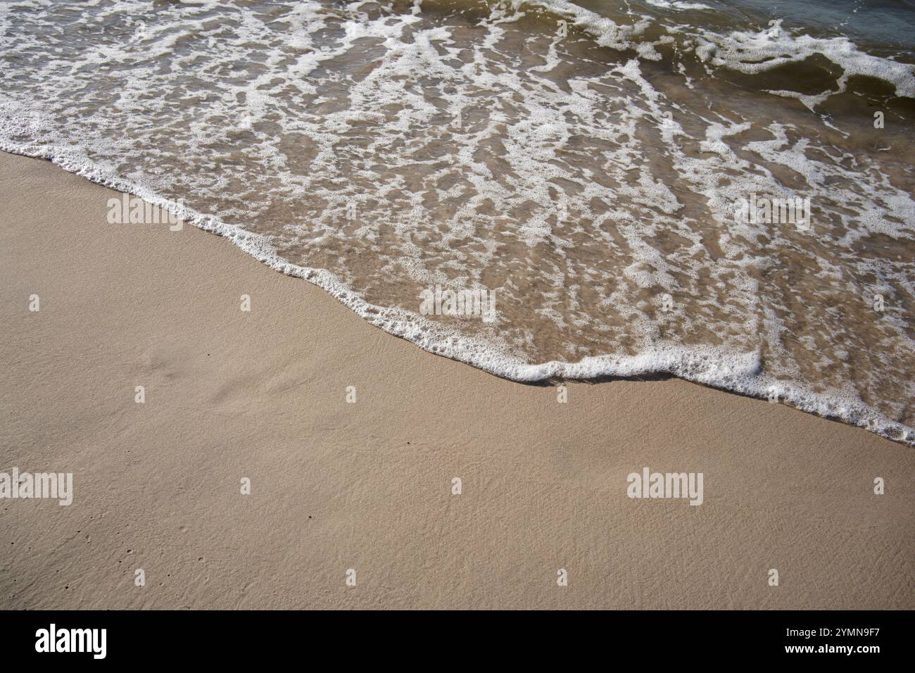 Gentle waves washing sandy hi-res stock photography and images - Alamy