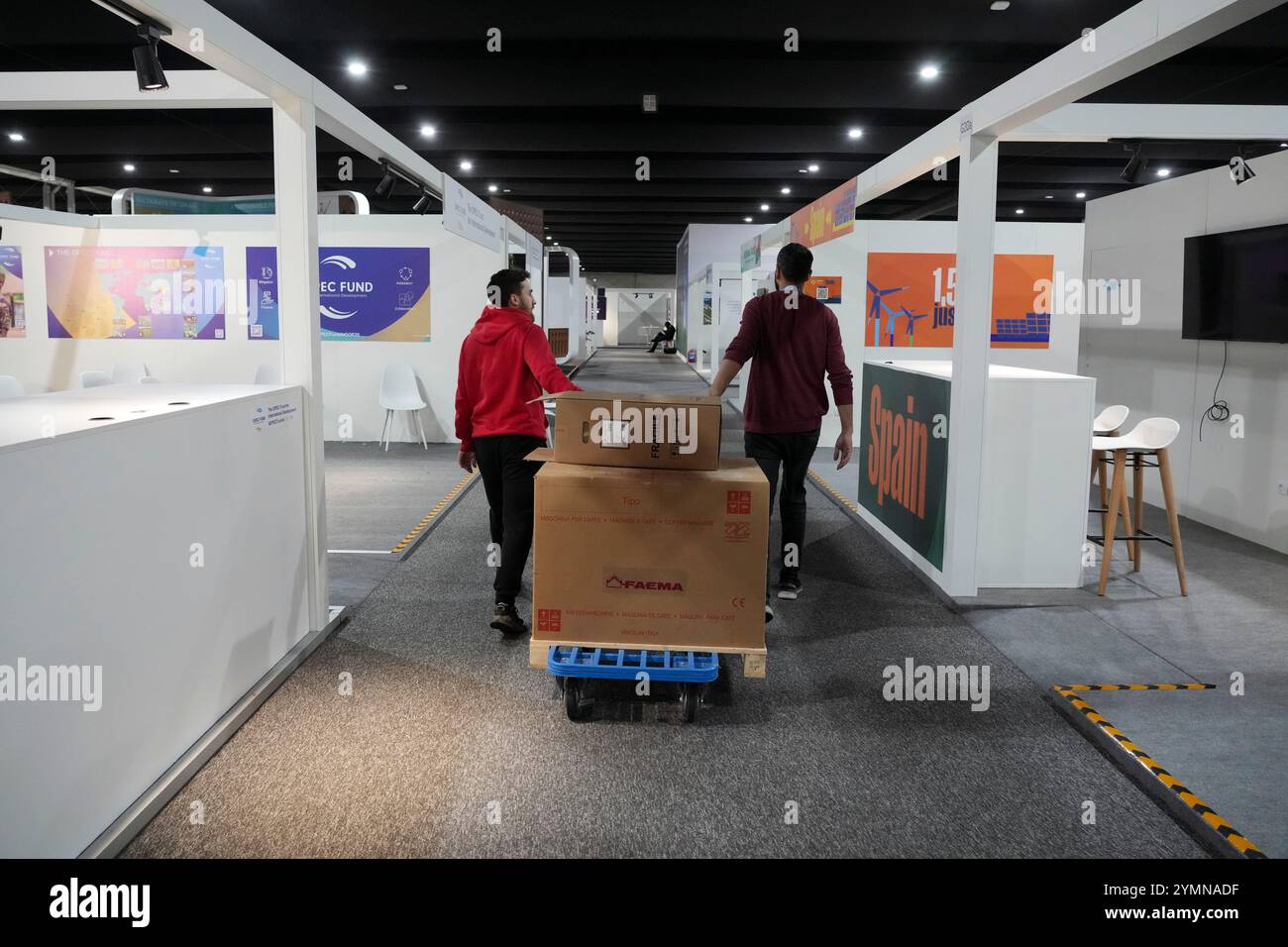 Boxes are brought out of pavilions as they're dismantled during the ...