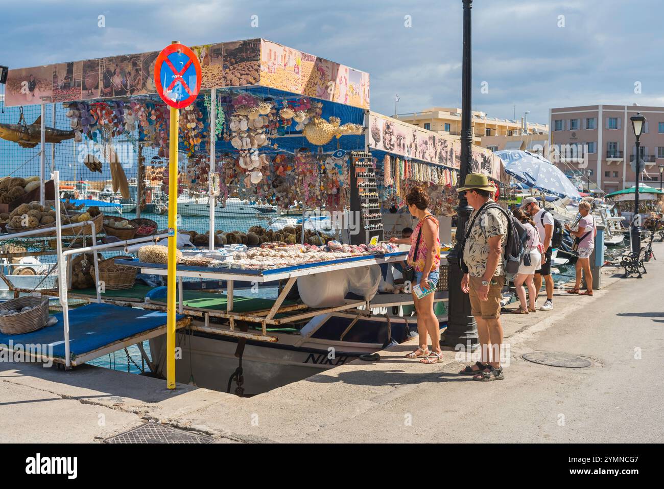 Crete shopping, view of tourists browsing a floating gift shop sited in ...