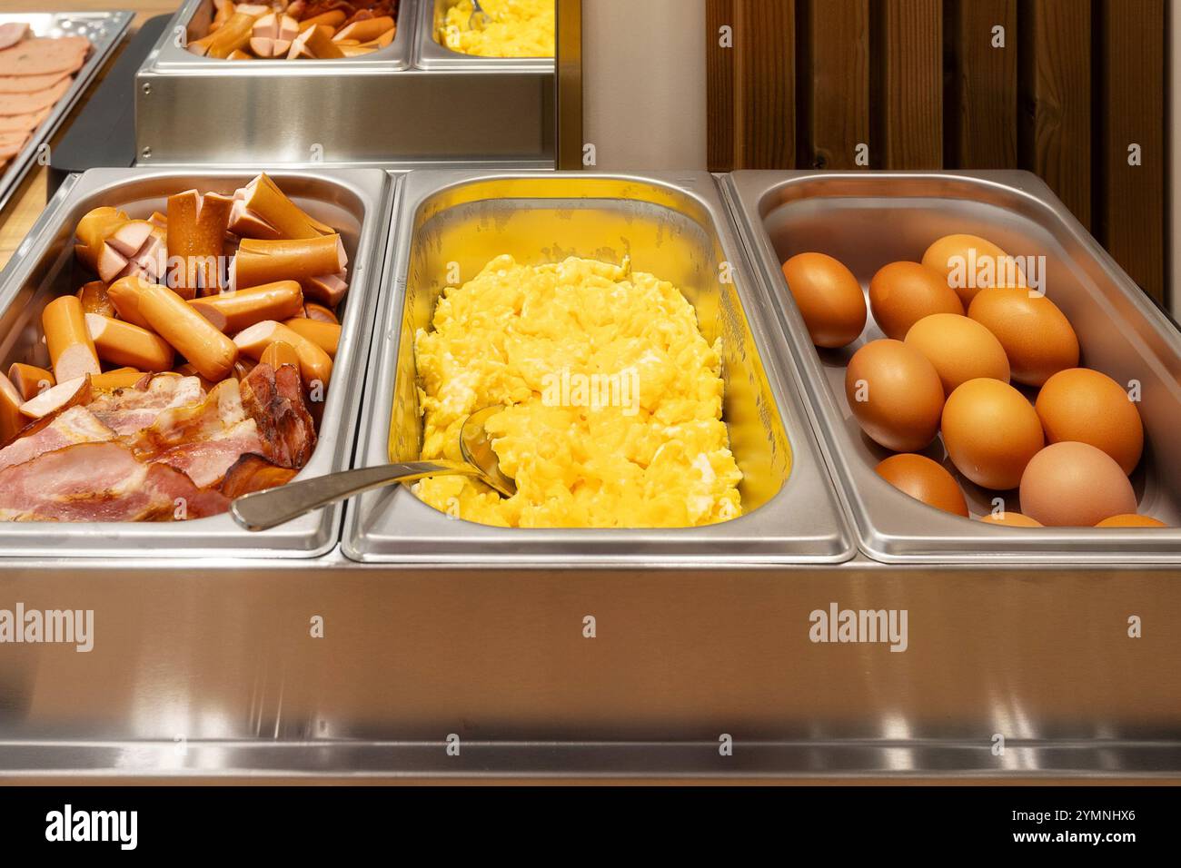 Diverse Breakfast Buffet Selection with hot sausages, ham, scrambled ...