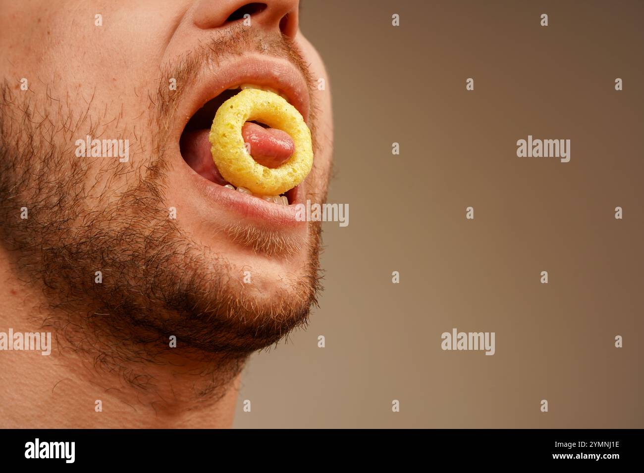 Snack lover about to enjoy a crispy golden treat captured in vivid ...