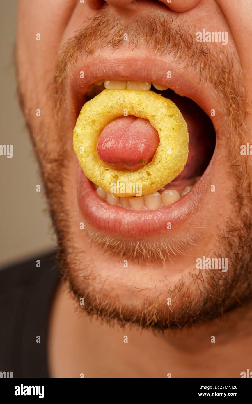 Snack lover about to enjoy a crispy golden treat captured in vivid ...