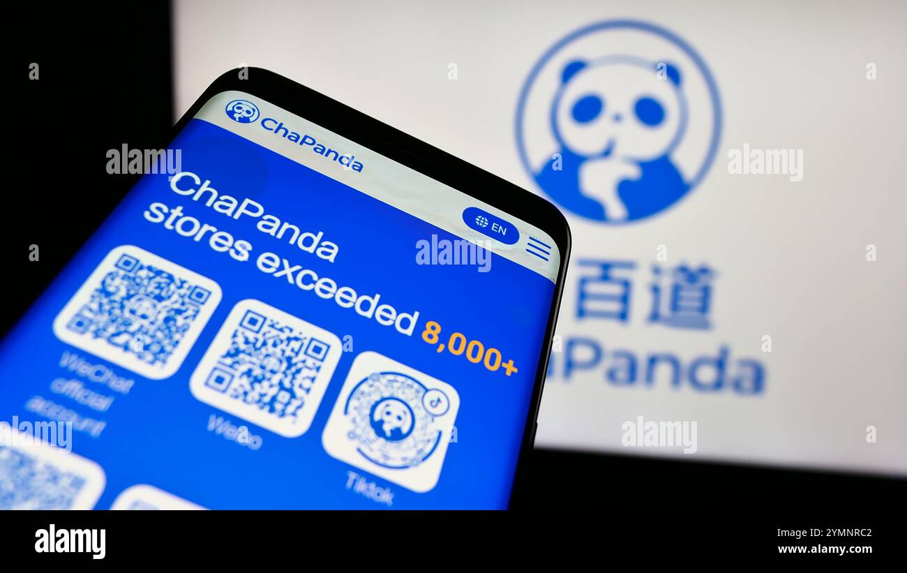 In this photo illustration, a smartphone with the website of Chengdu ...