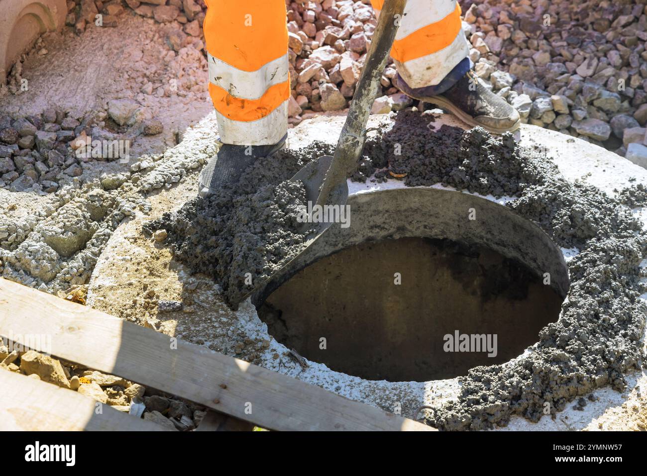 Constructed that top border of manhole for utility pit well will be ...