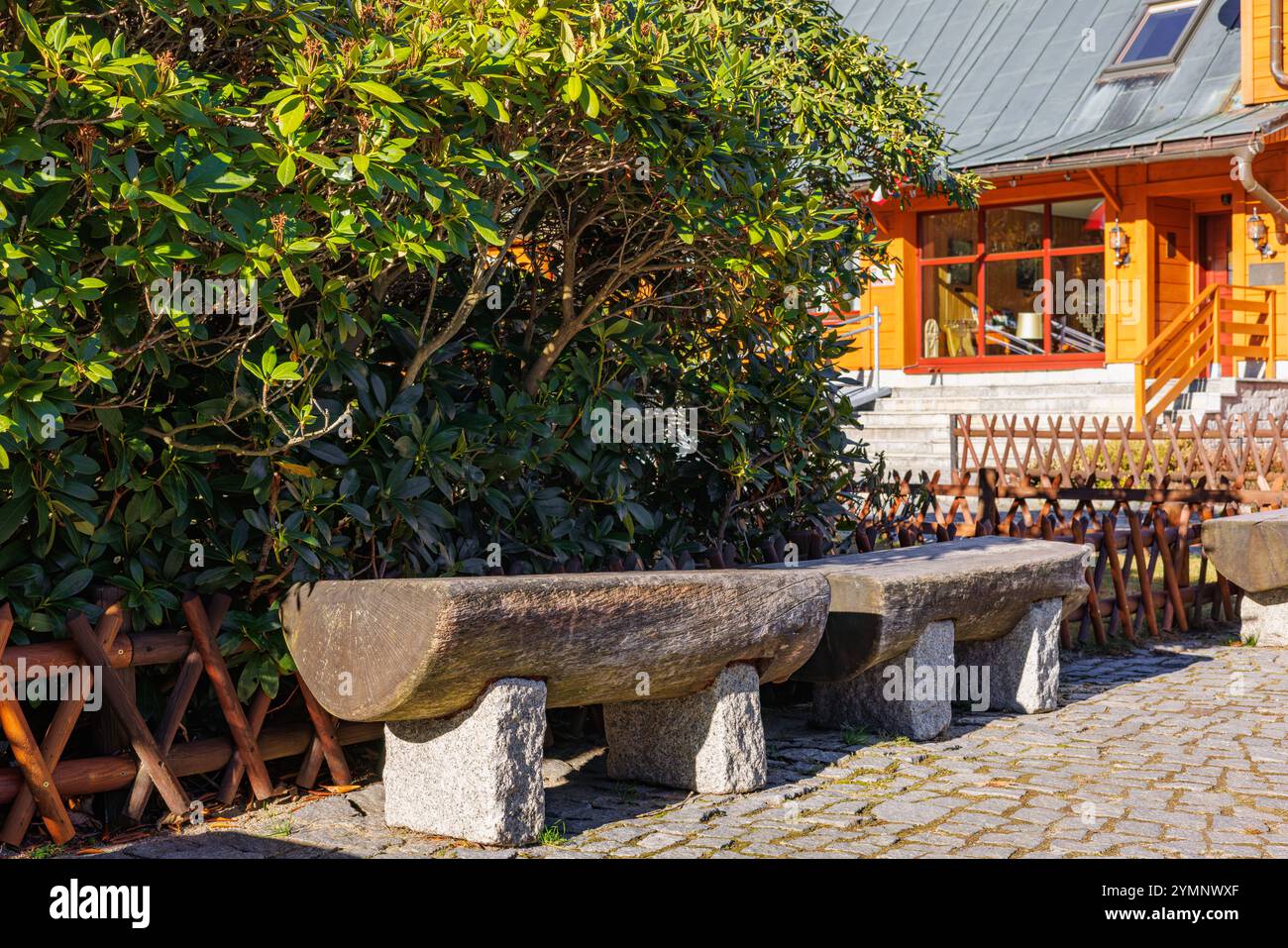 Log benches hi-res stock photography and images - Alamy