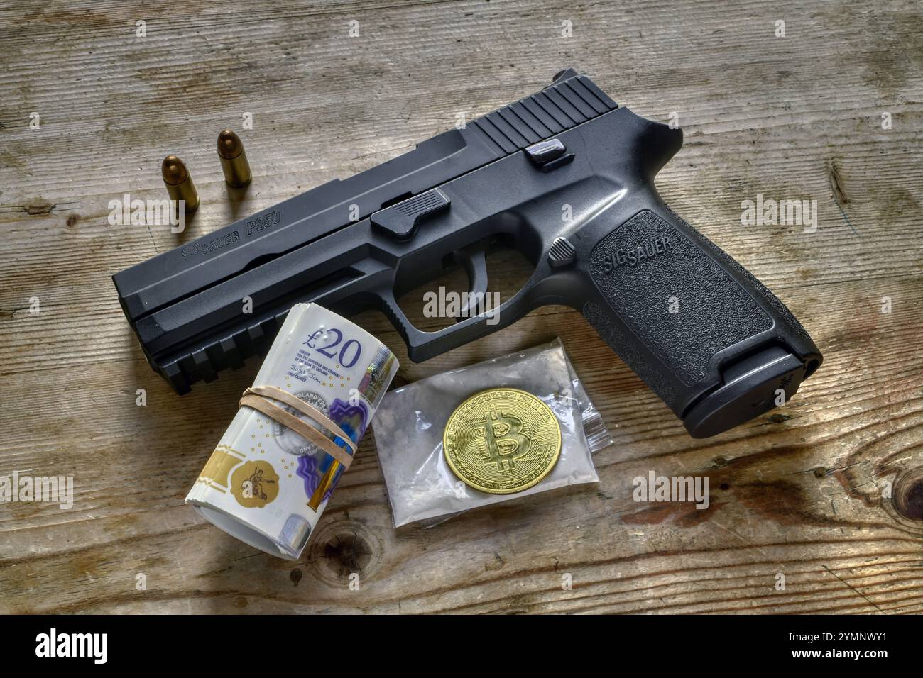 Bitcoin, drugs, money and Sig pistol Stock Photo - Alamy