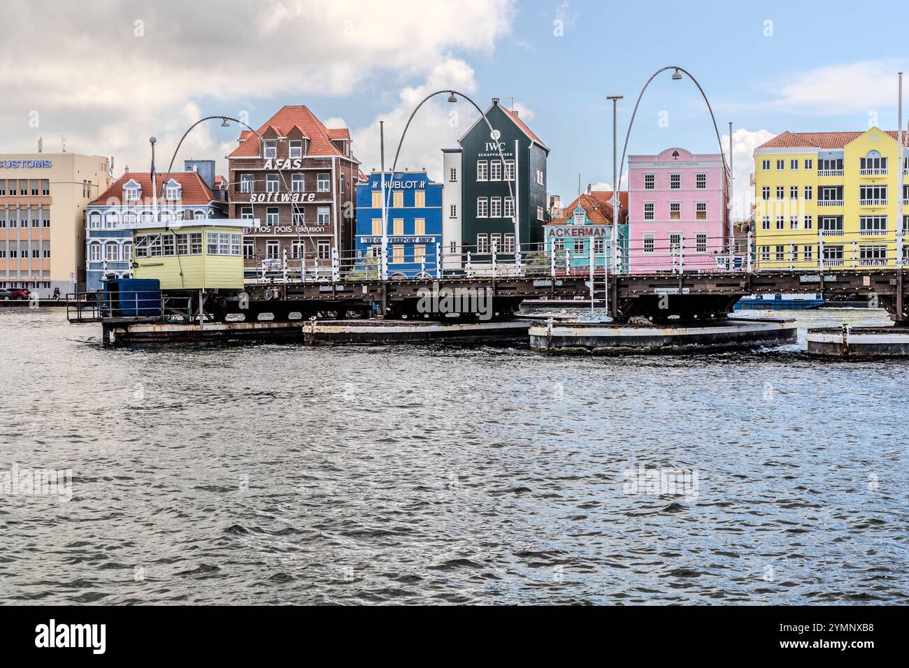 The Handelskade behind the half-open Konigin Emma (pontoon) bridge ...