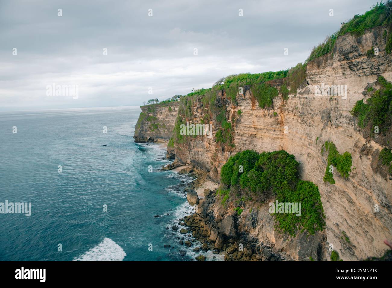 Overview panorama ocean shore, cliff. Sunset. Bali. Overwhelmed scene ...