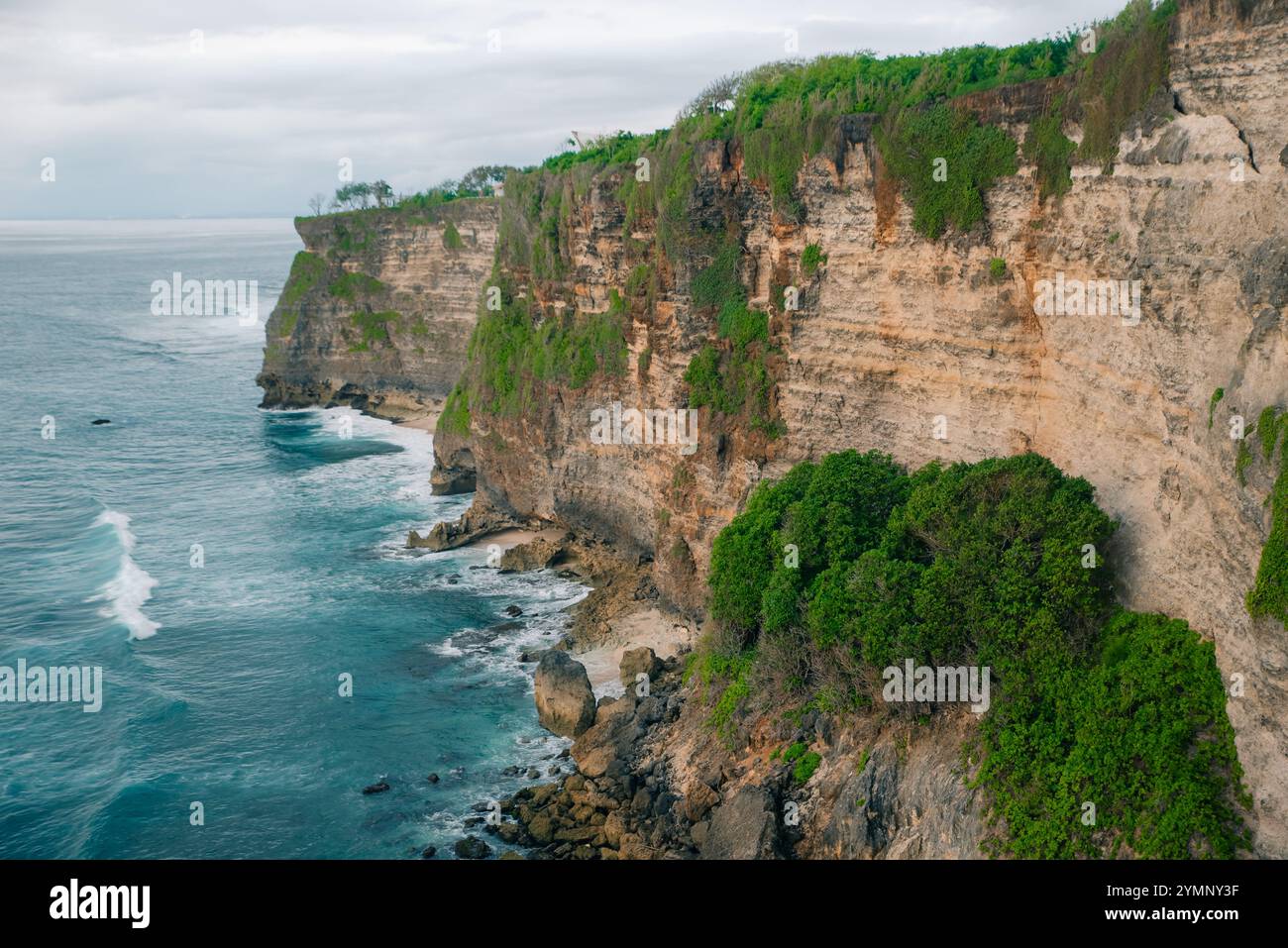 Overview panorama ocean shore, cliff. Sunset. Bali. Overwhelmed scene ...