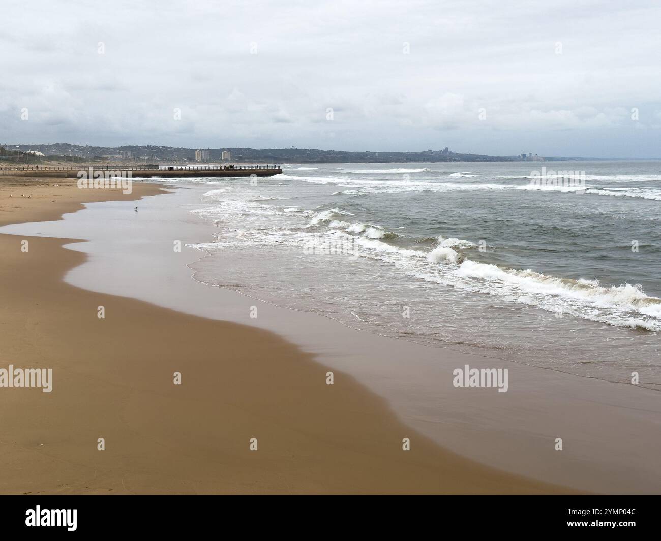 Durban sandy beach, stormy indian ocean, South Africa. Beachfront high ...