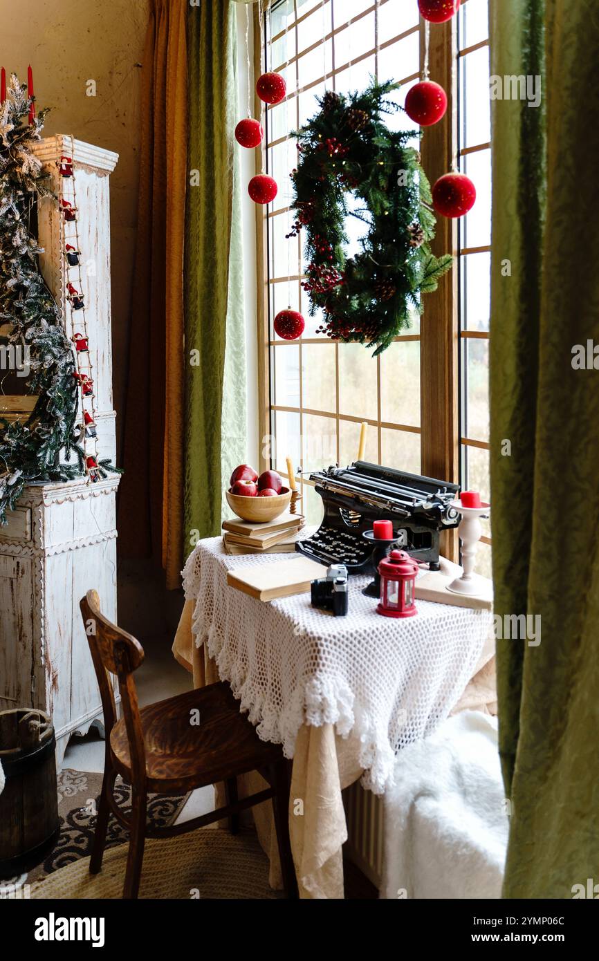 The writer's desk in New Year's decor with an antique typewriter Stock ...