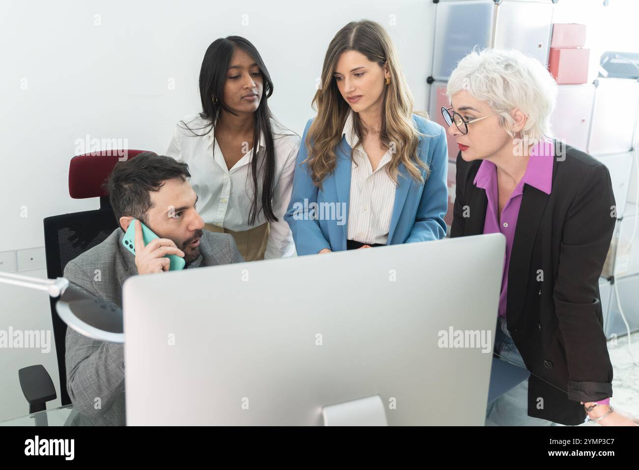 Four professionals gathered in hi-res stock photography and images - Alamy