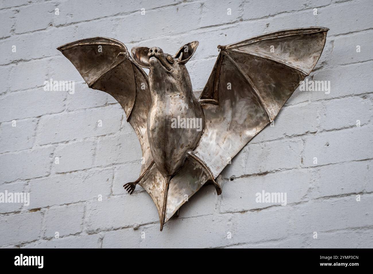 Shakespeare of teh North bat sculpture on a barbers wall in Prescot ...