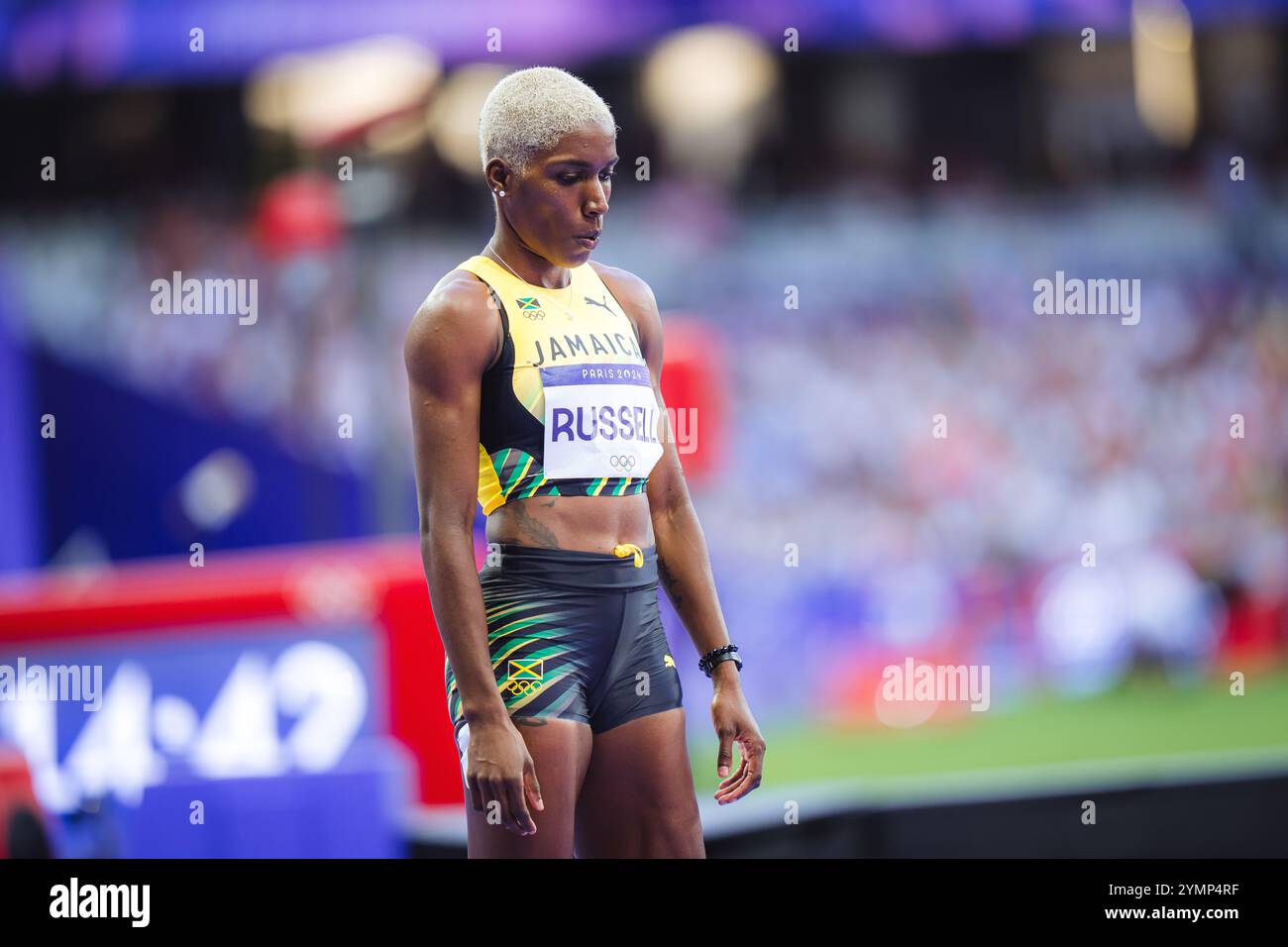 Janieve Russell participating in the 400 meters hurdles at the Paris ...