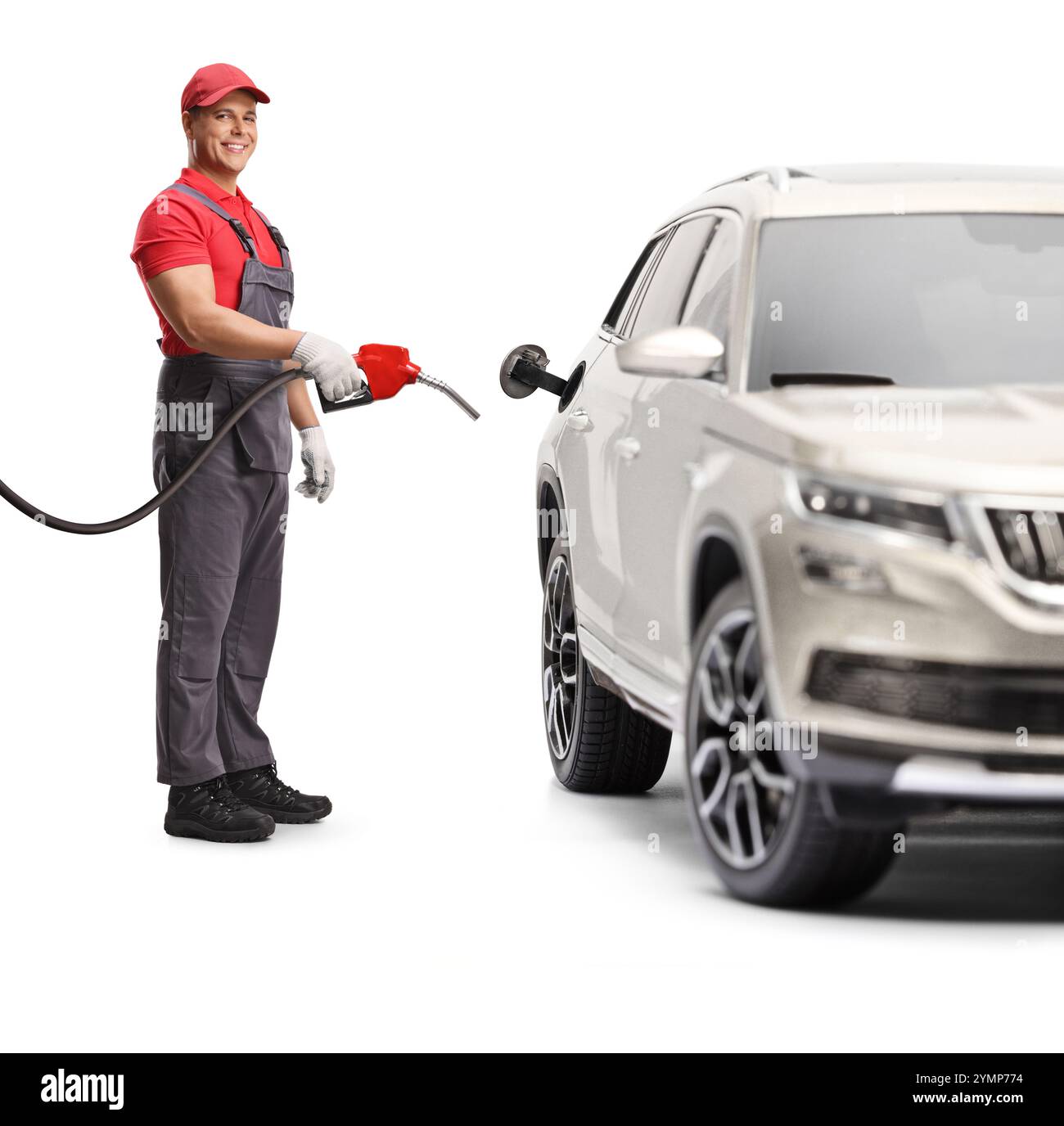 Gas station worker filling a vehicle with fuel and smiling isolated on ...