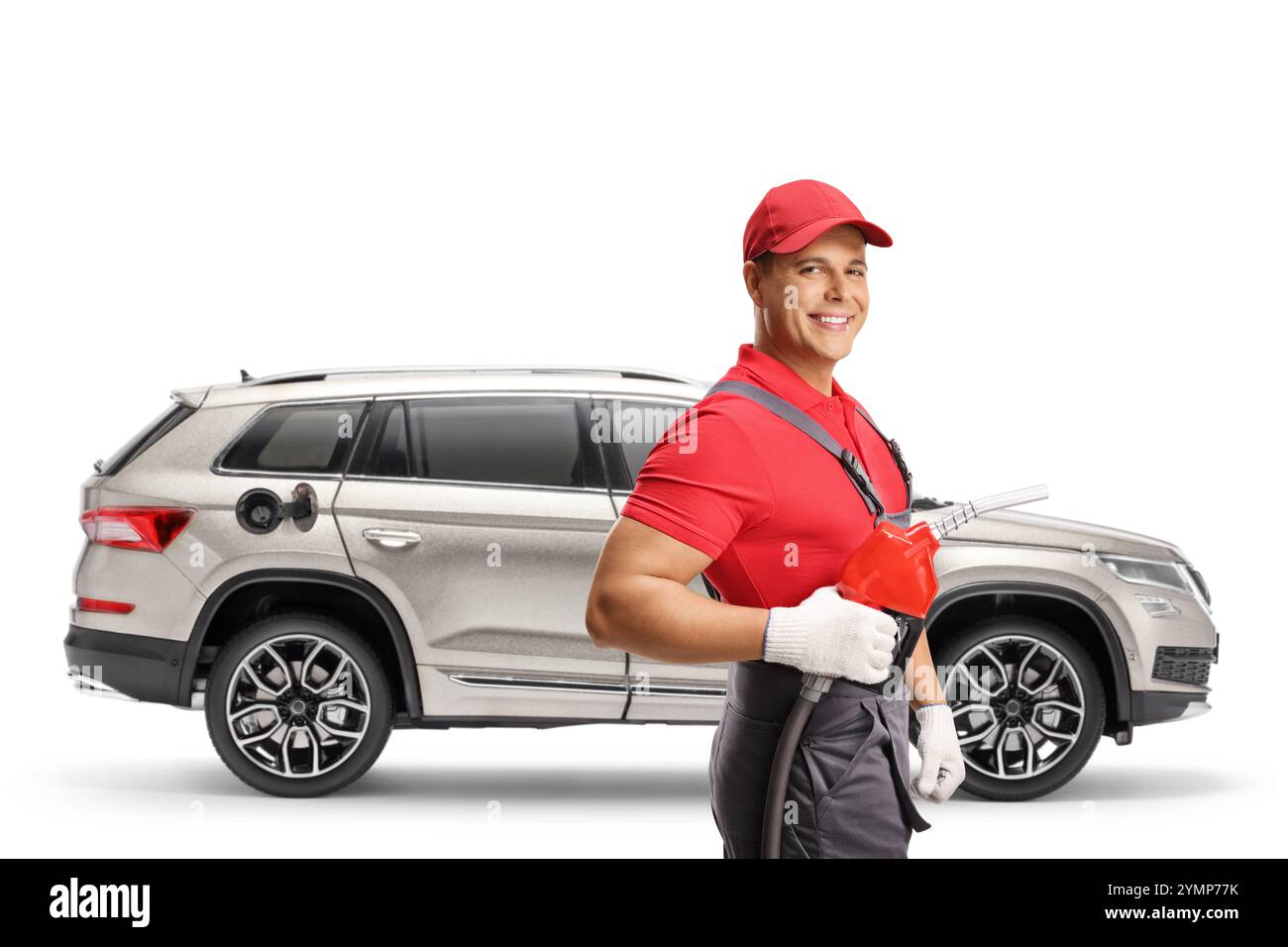 Petrol station worker filling a vehicle with fuel and smiling isolated ...