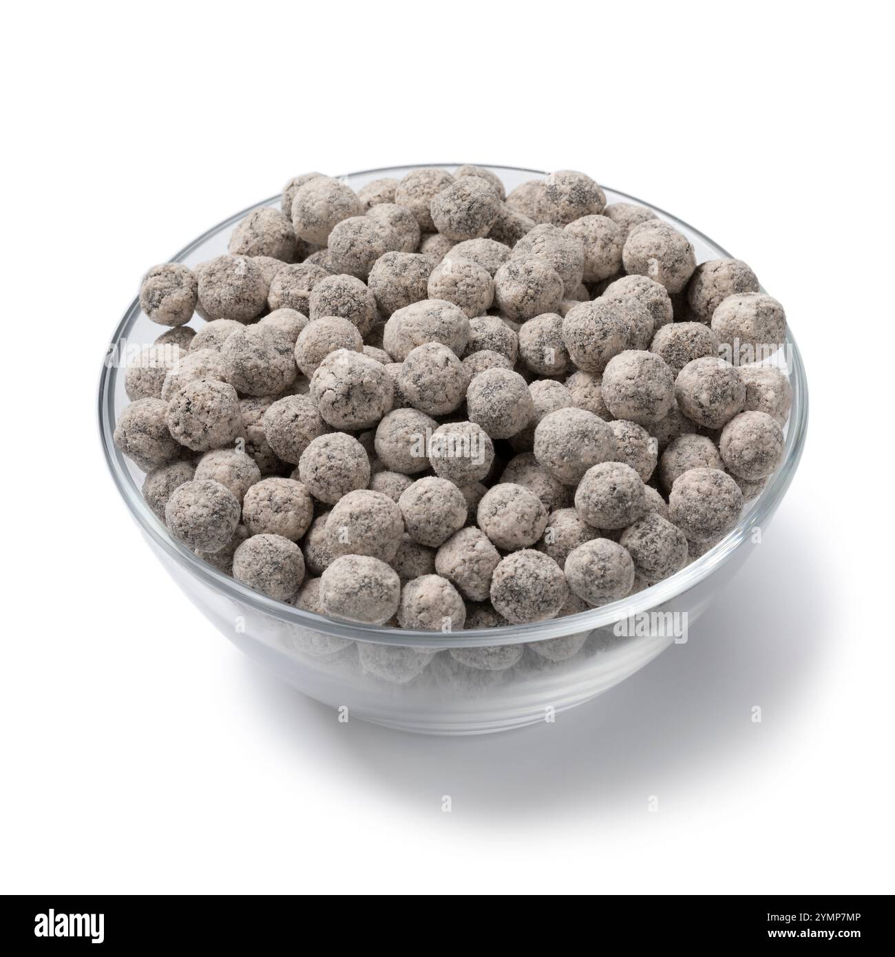 Glass bowl with uncooked black tapioca pearls isolated on white ...