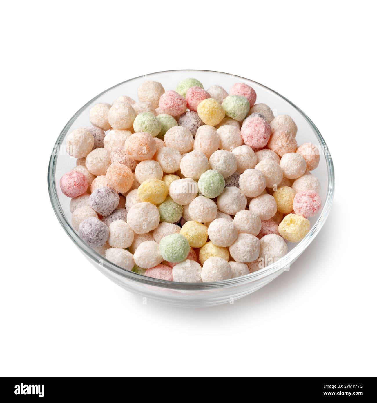 Glass bowl with colorful uncooked tapioca pearls isolated on white ...
