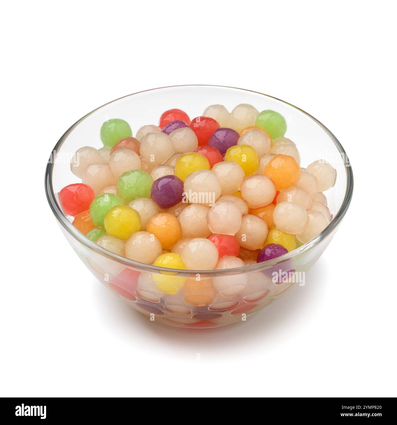 Glass bowl with cooked colorful tapioca pearls close up isolated on ...