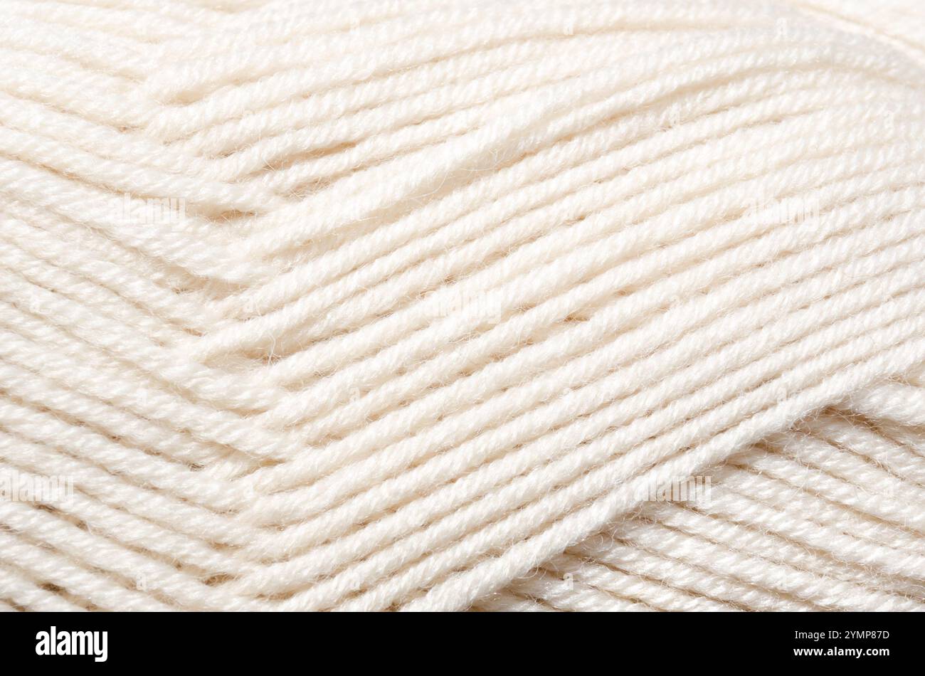 Texture of wool blend yarn, milky color. Warm wool blend yarn close-up ...
