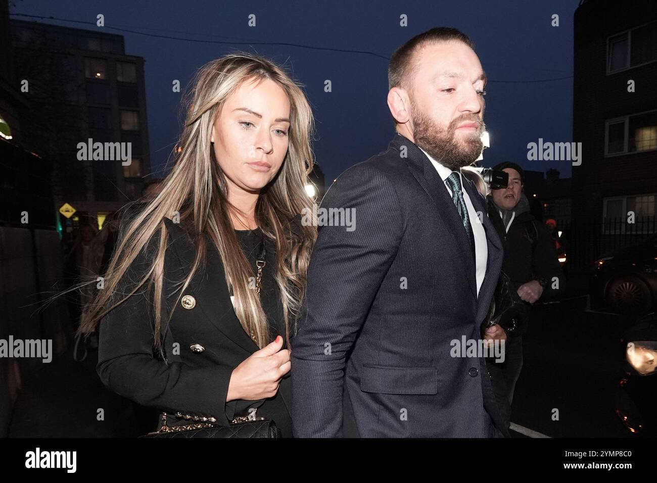 Mixed martial arts fighter Conor McGregor and partner Dee Devlin arrive ...