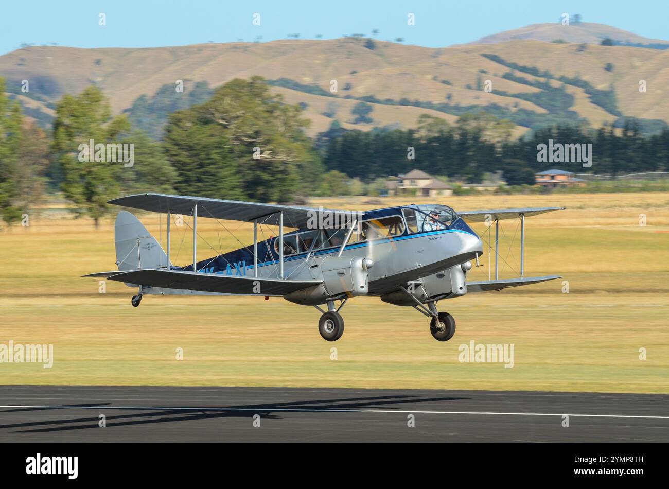 de Havilland DH-84 Dragon biplane ZK-AXI named Taniwha taking off at ...