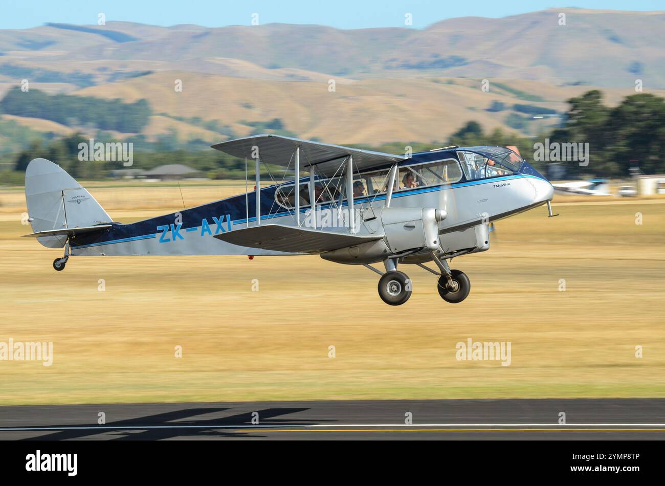 de Havilland DH-84 Dragon biplane ZK-AXI named Taniwha taking off at ...