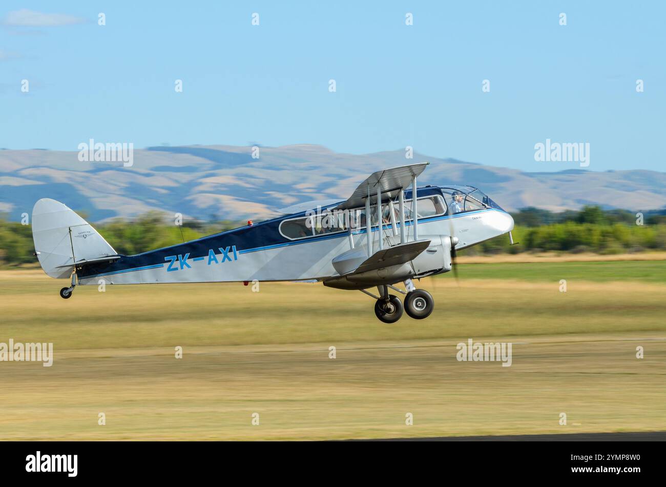 de Havilland DH-84 Dragon biplane ZK-AXI named Taniwha taking off at ...