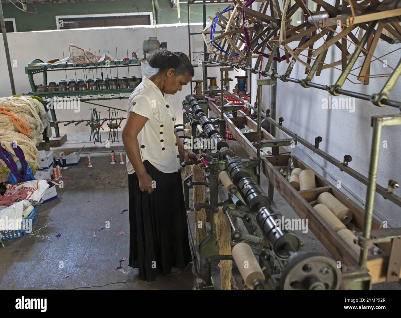 Sri Lankan woman in a weaving mill, Selyn Textiles, Kurunegala, North ...