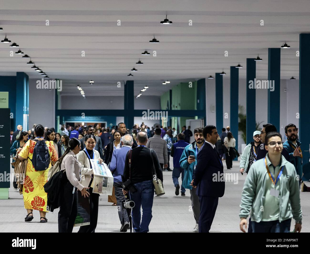 Baku, Azerbaijan. 22nd Nov, 2024. Participants walk in Blue Zone during ...