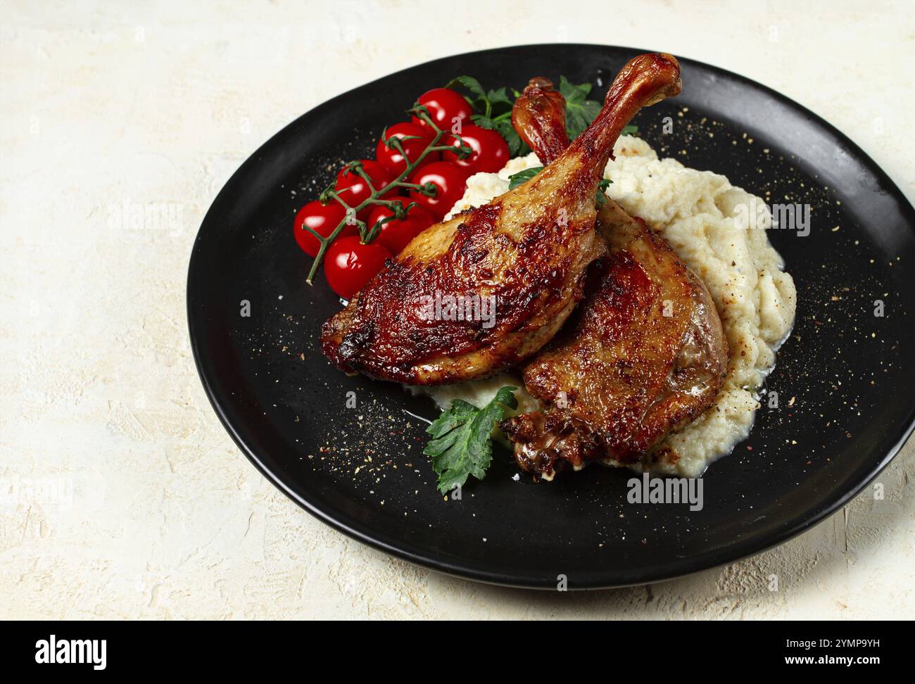 Fried duck shank, cauliflower puree, cherry tomatoes, homemade, no ...