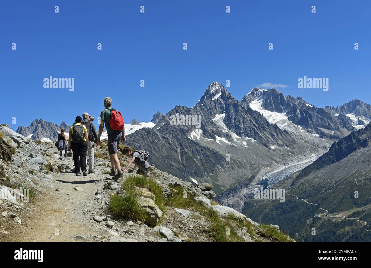 Hikers in the Chamonix hiking area on the way to the mountain lake Lac ...