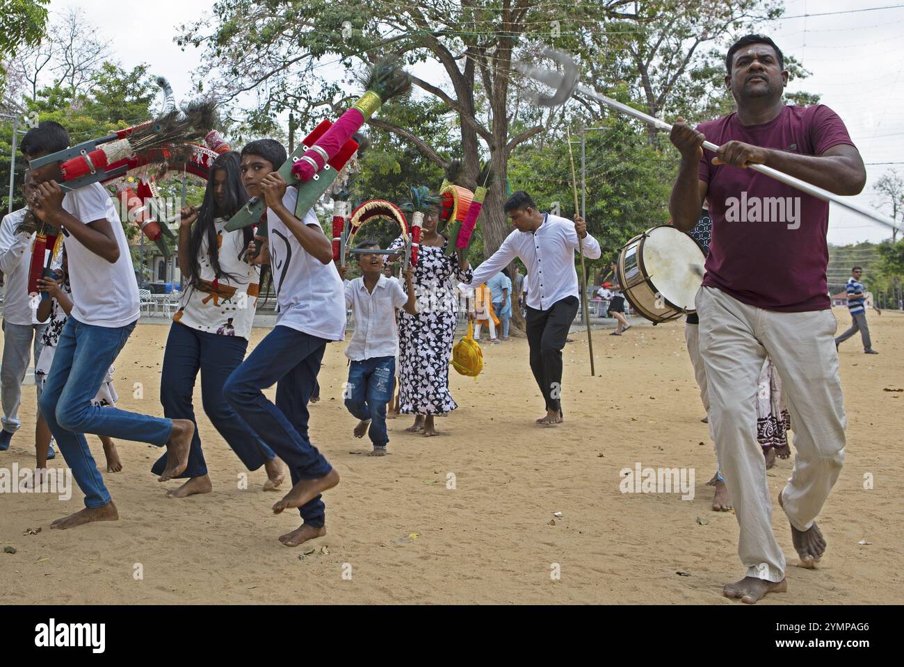 Sri Lankan pilgrims dancing in the Buddhist temple Ruhunu Maha ...