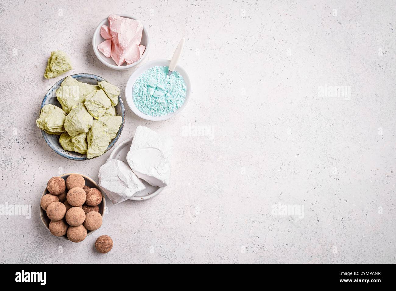 Edible various Clay Stones, clay rocks and powder on white background ...