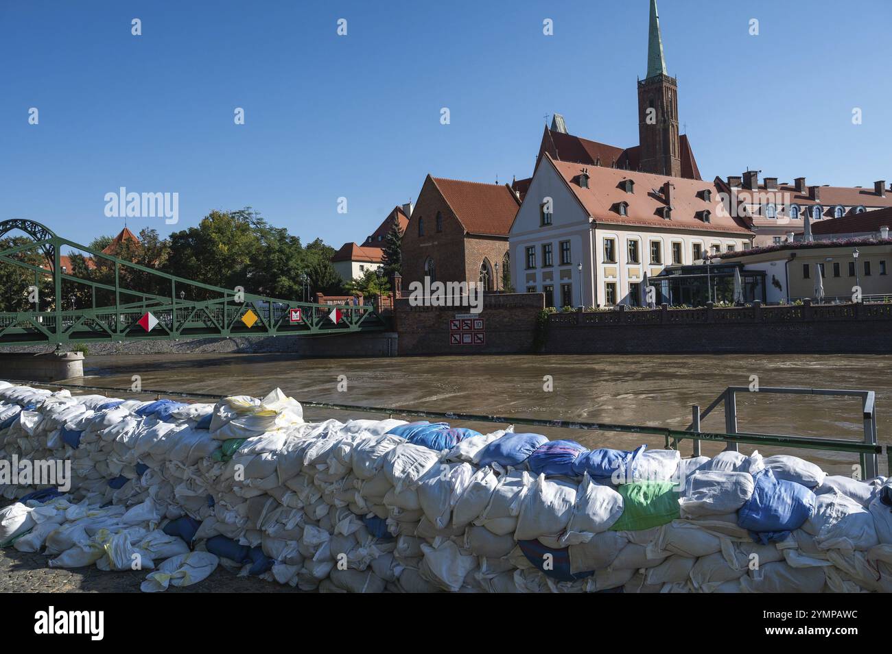Reinforcement of river embankments with sandbags, flood risk in Wroclaw ...