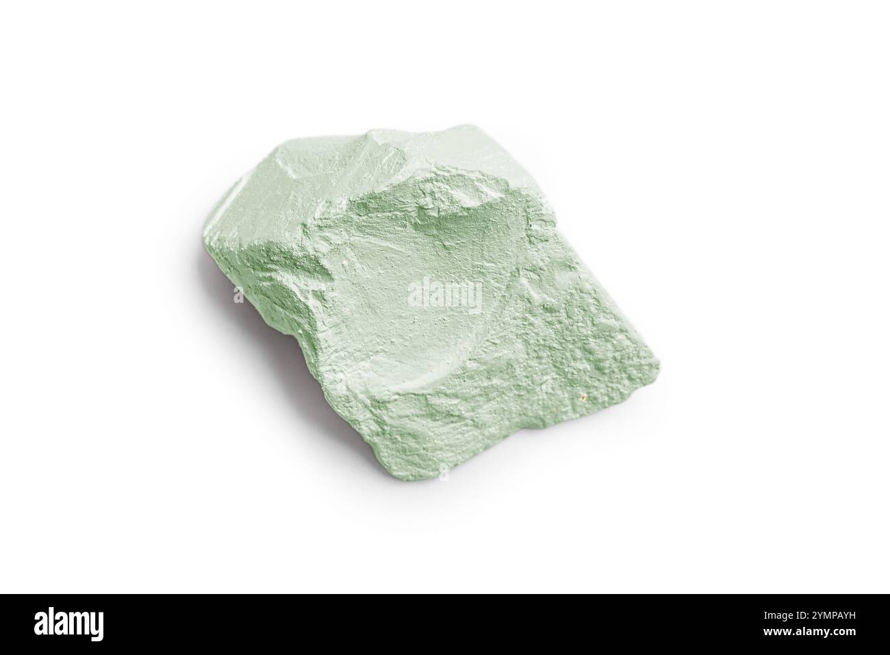 Piece of green edible clay or chalk isolated on white background ...