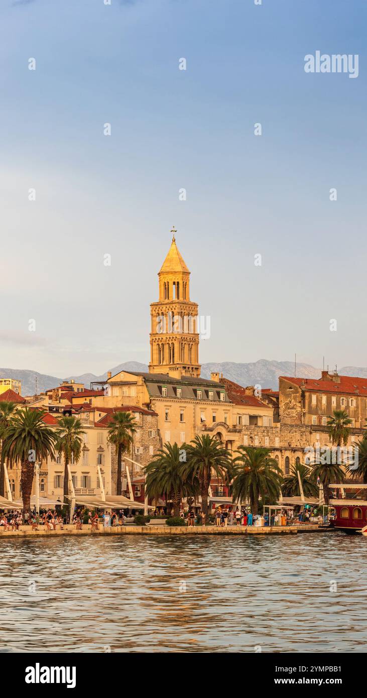 Sunset on the lively Riva promenade in Split, Croatia. Lined with palm ...